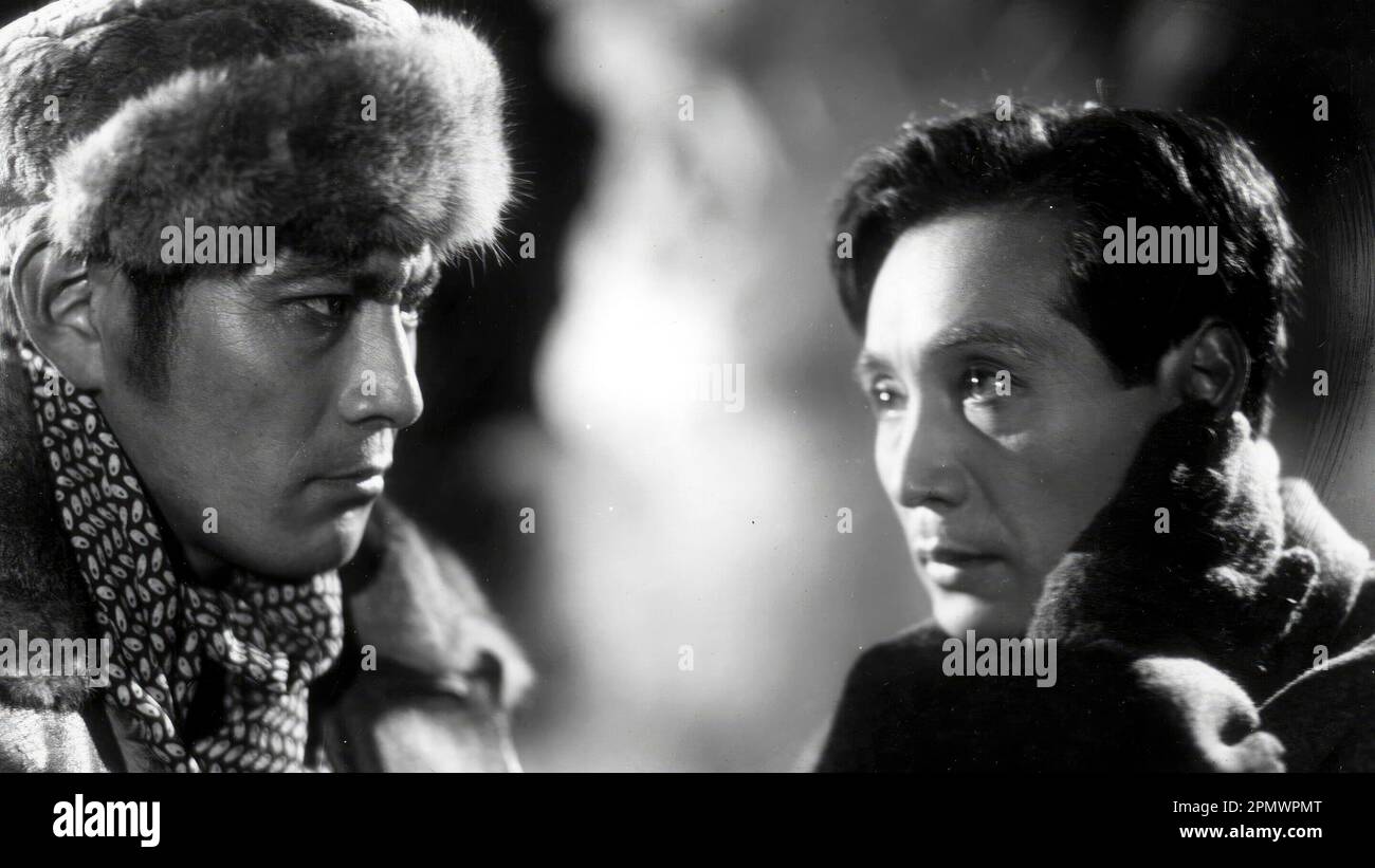 TOSHIRO MIFUNE and MASAYUKI MORI in THE IDIOT (1951) -Original title: HAKUCHI-, directed by ...