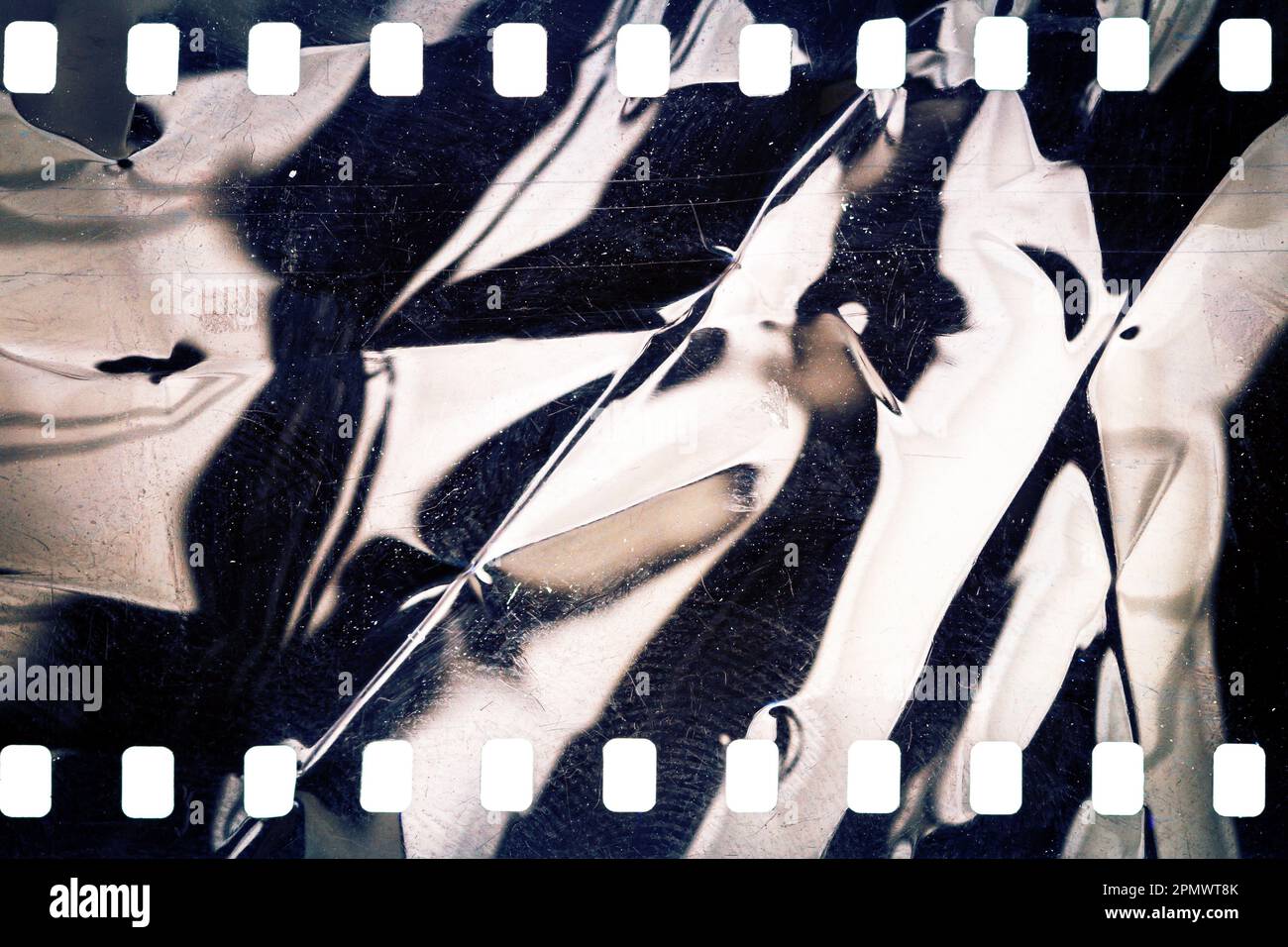 Dusty and grungy 35mm film texture or surface. Perforated scratched ...