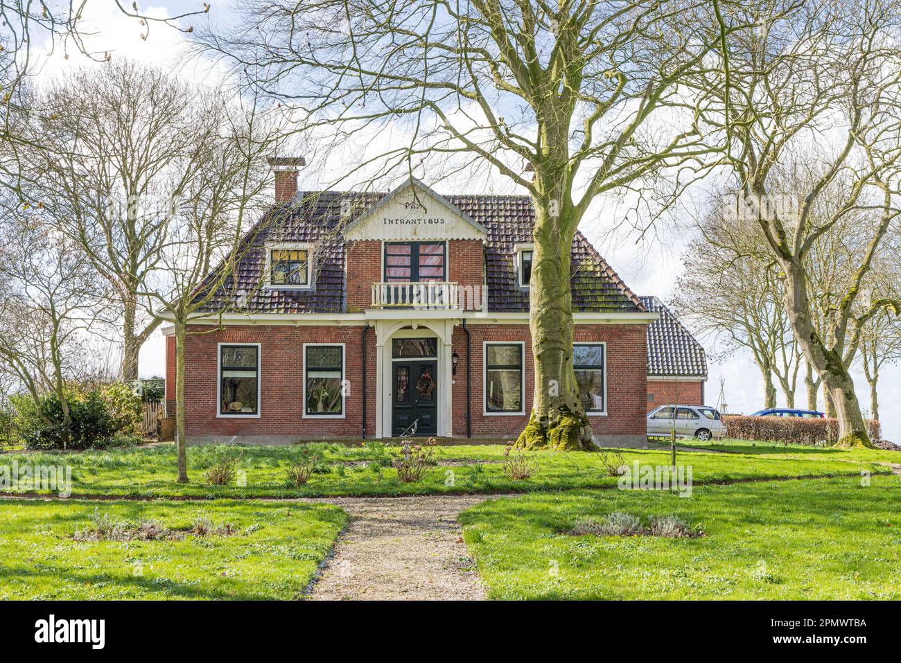 Dorwerd, The Netherlands - March 27, 2023: Picturesque house iwith ...