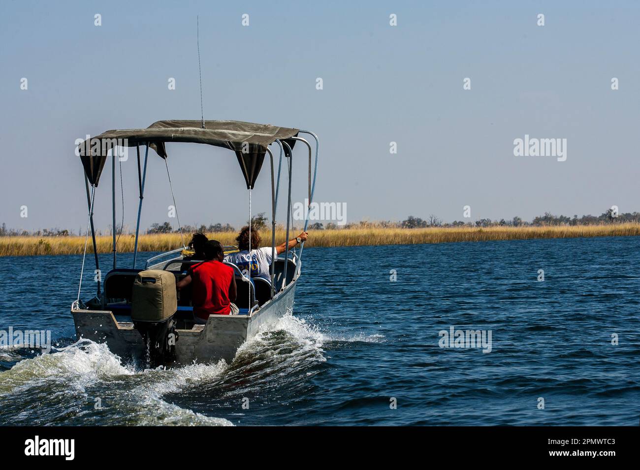 Boat safari on the Okavango Delta, Moremi Game Reserve, Botswana Stock ...
