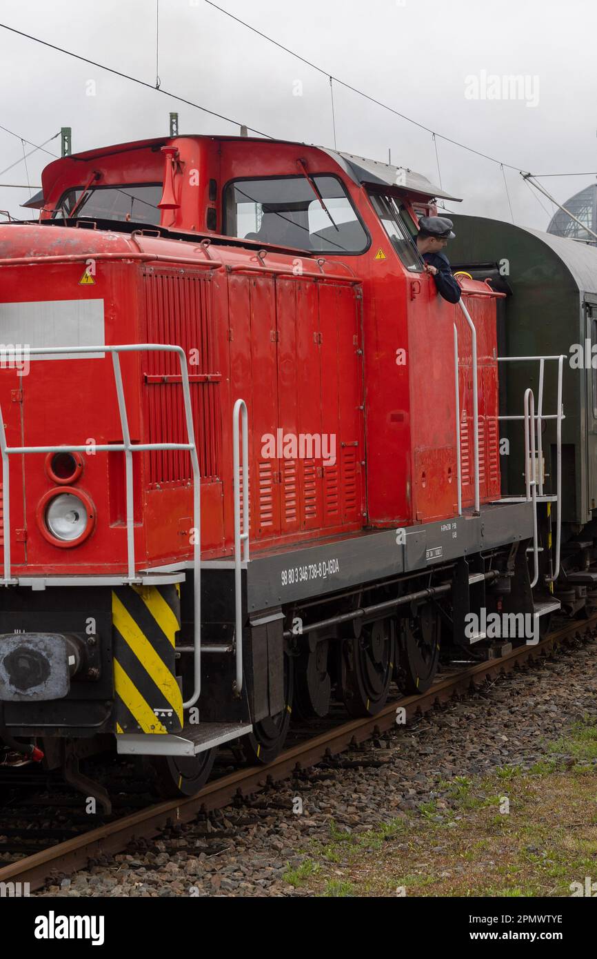 Dresden, Germany. 15th Apr, 2023. A train driver looks out from the ...