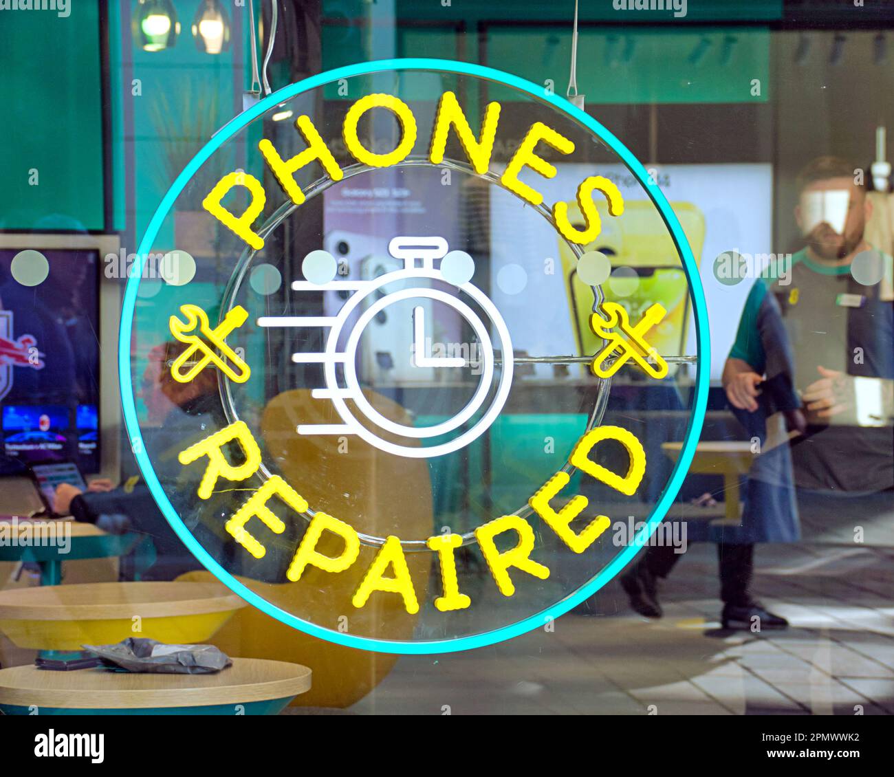 phones repaired sign in window Stock Photo - Alamy