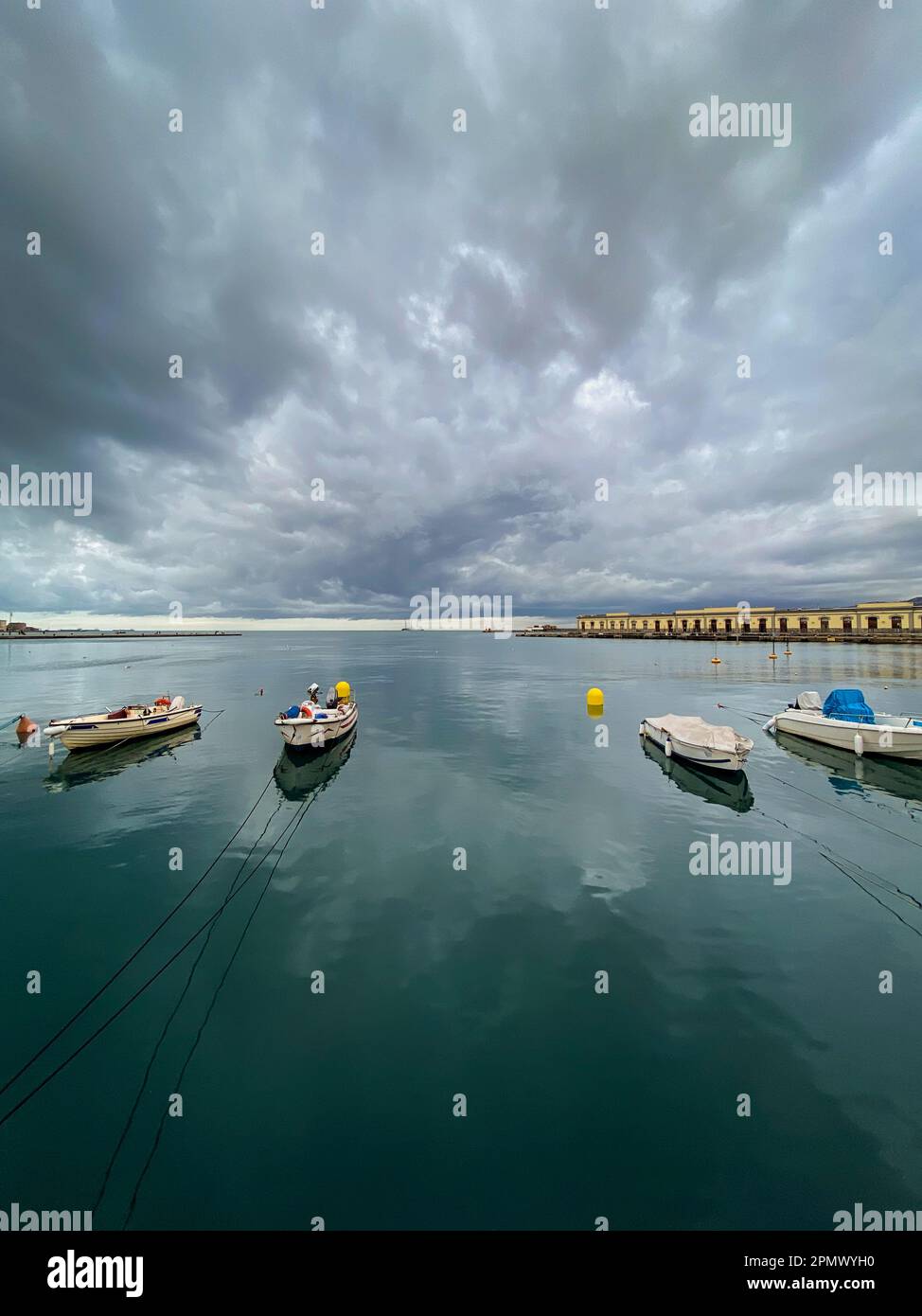 Trieste Seafront with cloudy sky in the winter season Stock Photo - Alamy