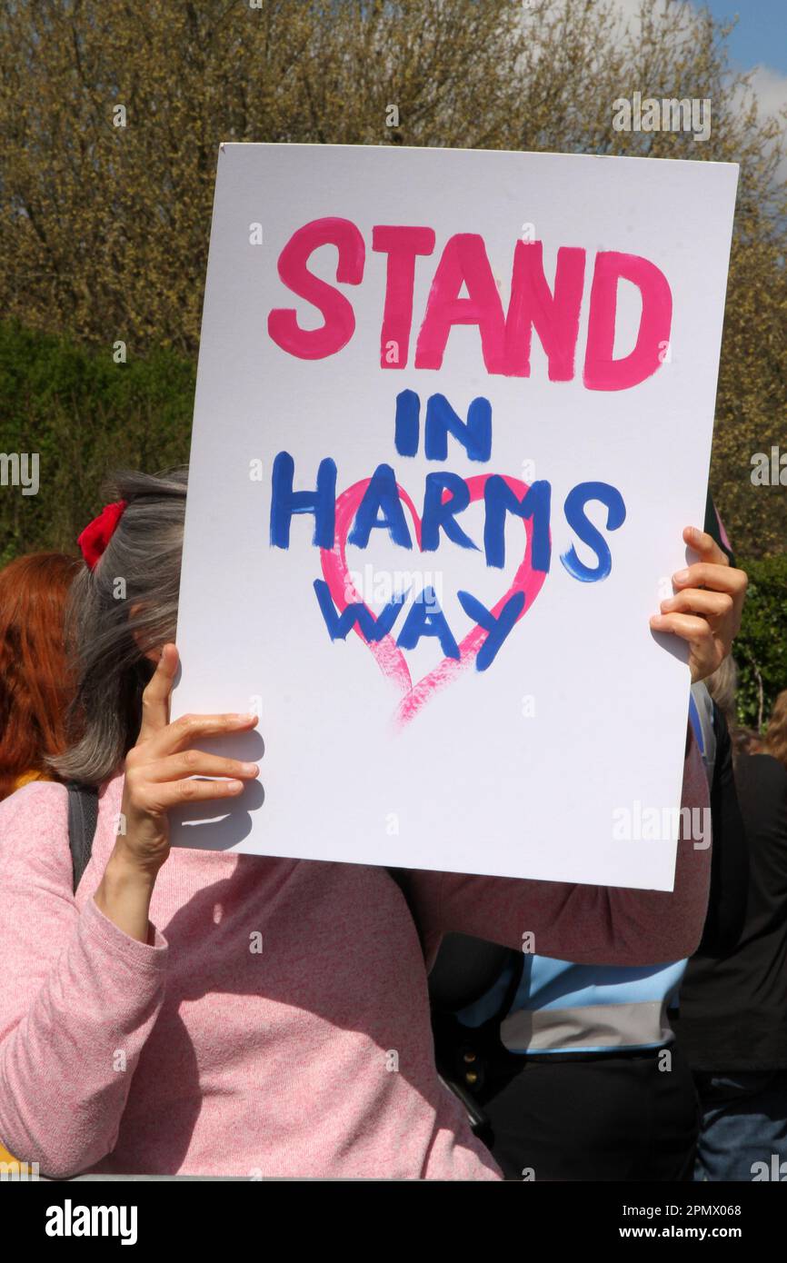 Stand in harms way cardboard sign hi-res stock photography and images ...