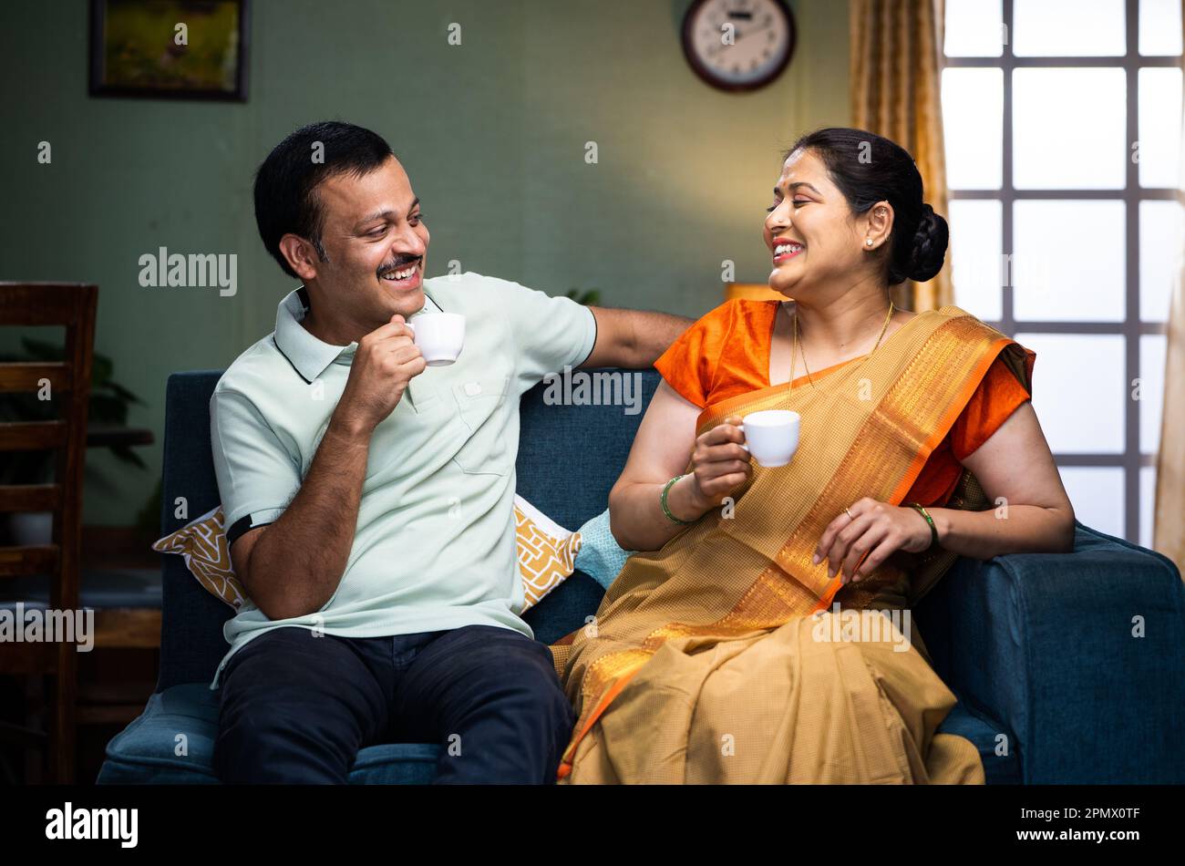Indian couple having coffee hi-res stock photography and images - Alamy