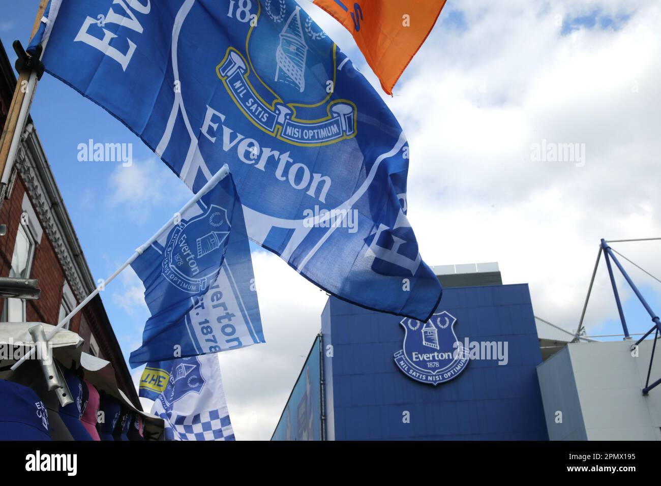 Large flags being sold outside the stadium ahead of the Premier League ...