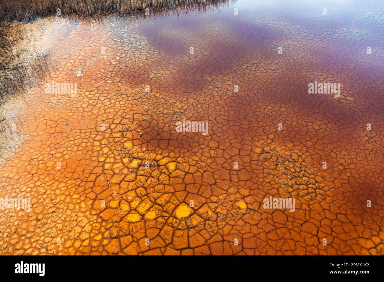 vast titanium mine with tailing ponds filled with technical fluids used ...