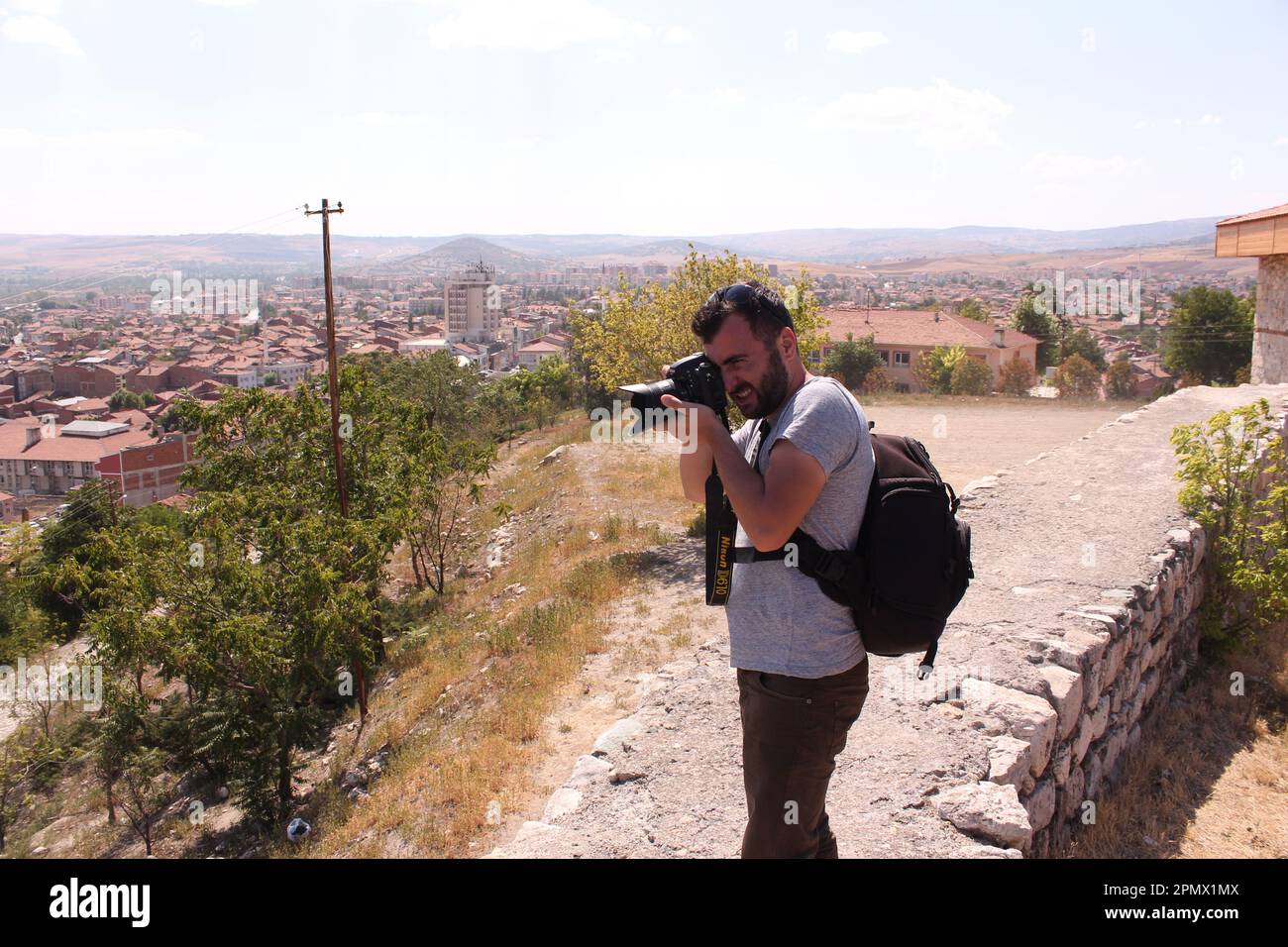 Traveler photographer caught on camera in Turkey Stock Photo - Alamy