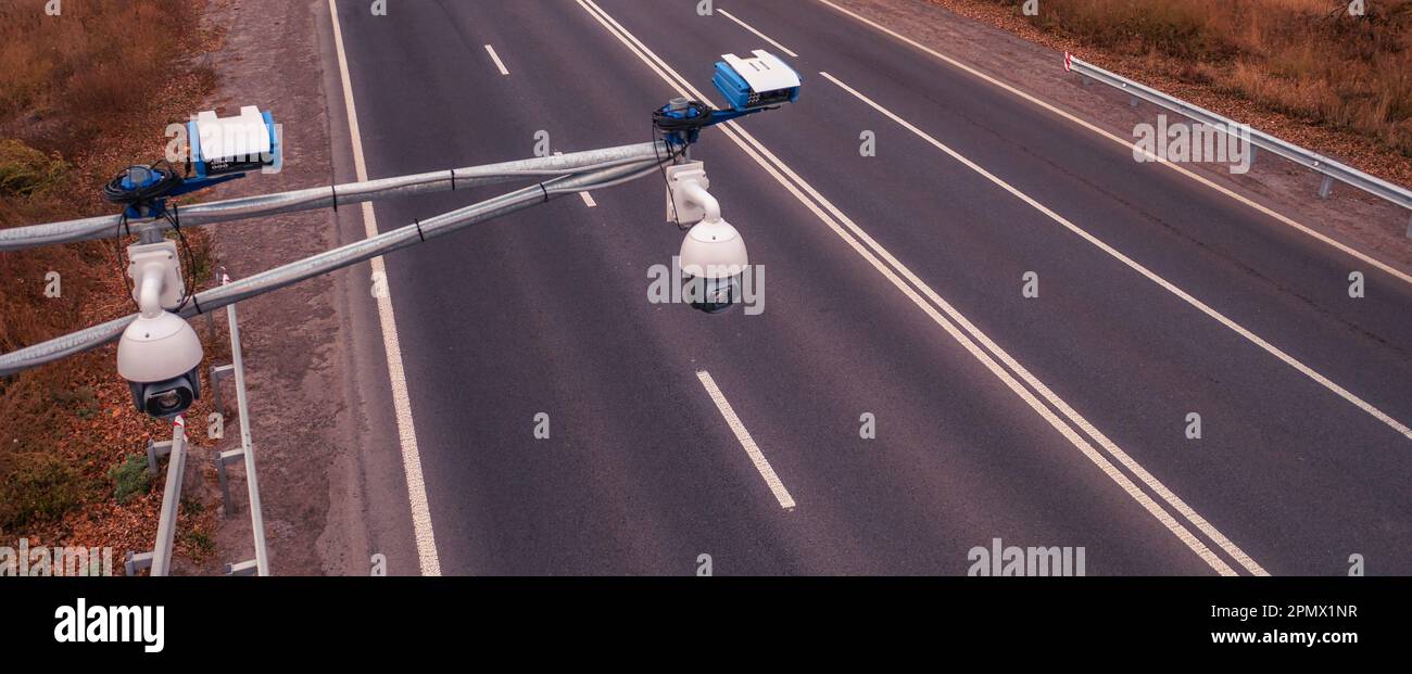 A speed camera captures every vehicle passing by on the road, ensuring ...
