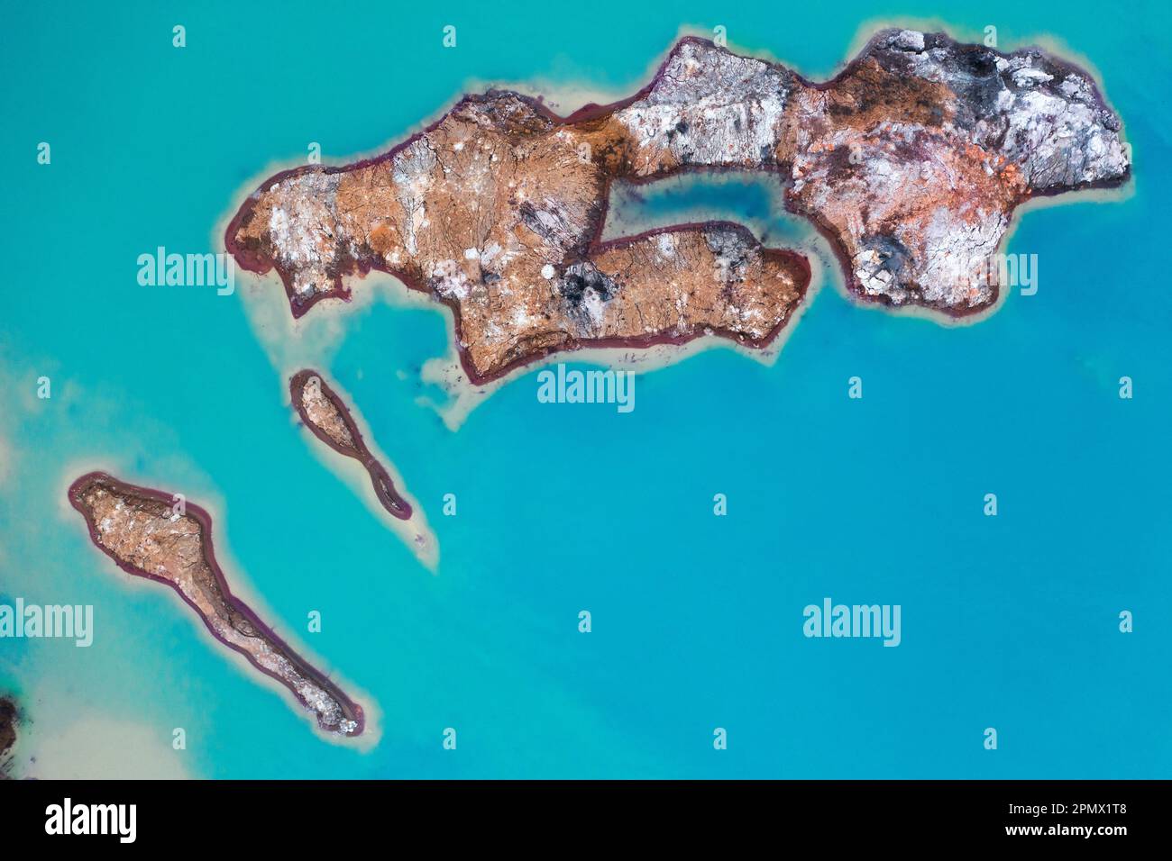 Fly high above a titanium mine and be amazed at the striking colors of ...