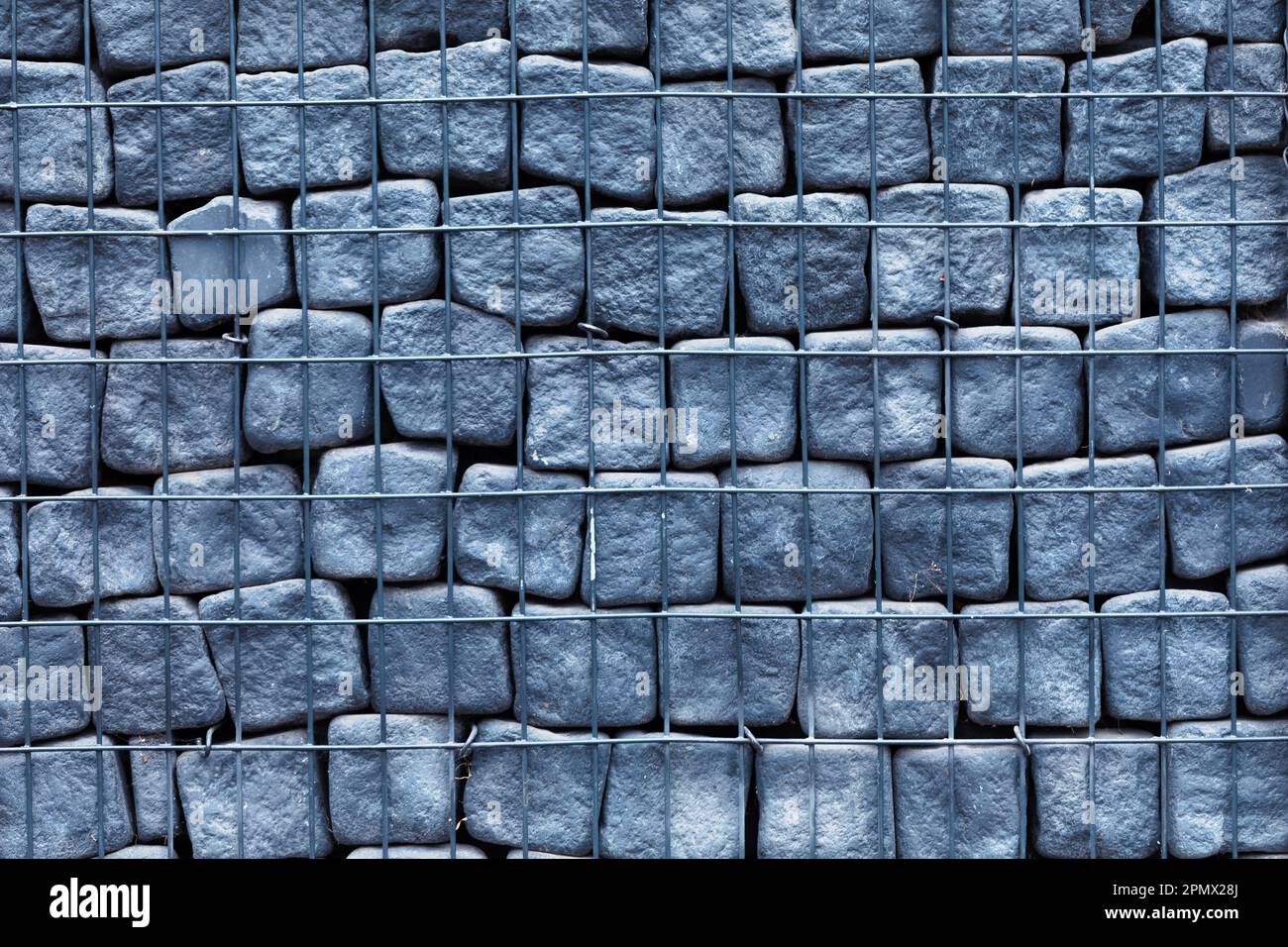 simple yet striking shot of Gabion rectangular stones' textured surface ...