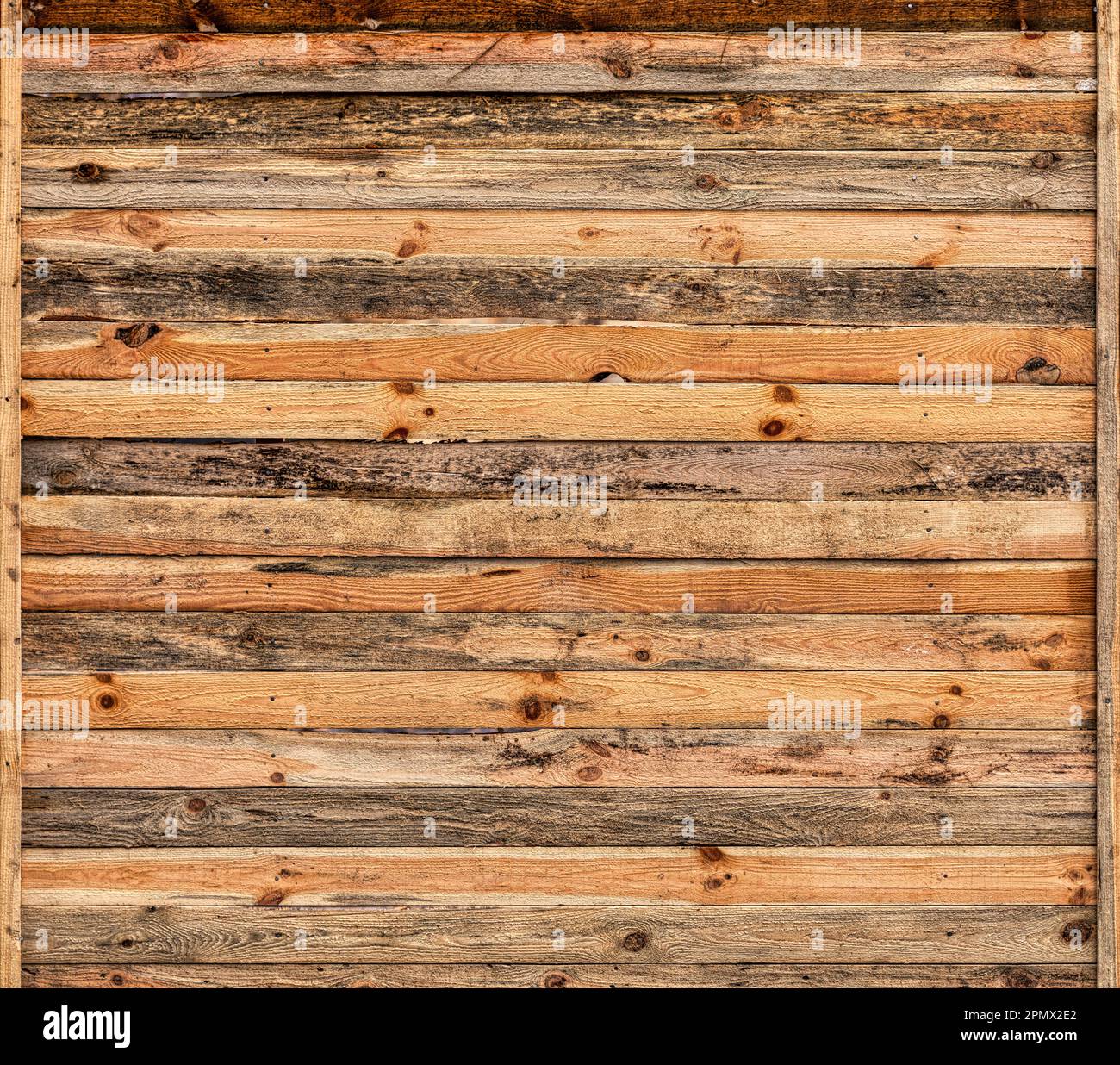rustic orange wood wall with an aged and textured appearance Stock ...