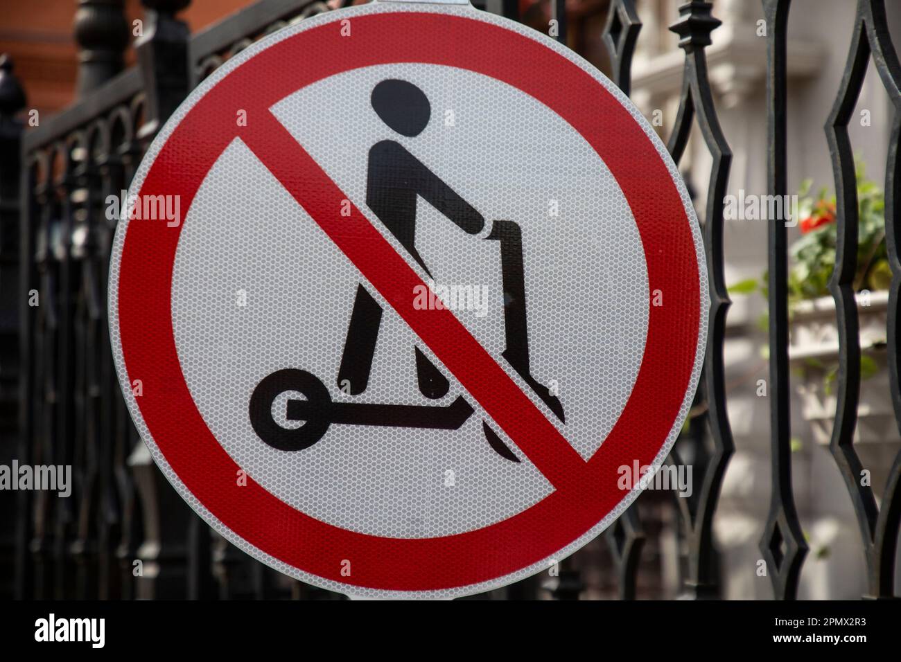 A road sign prohibiting the use of kick scooters, is seen at pedestrian ...