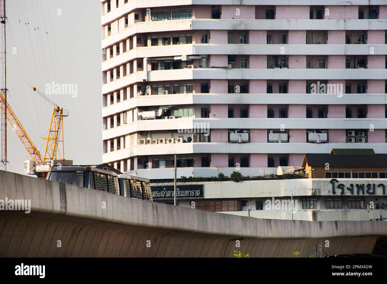 View landscape cityscape of bangkok city and office building tower with BTS skytrain gold line ...
