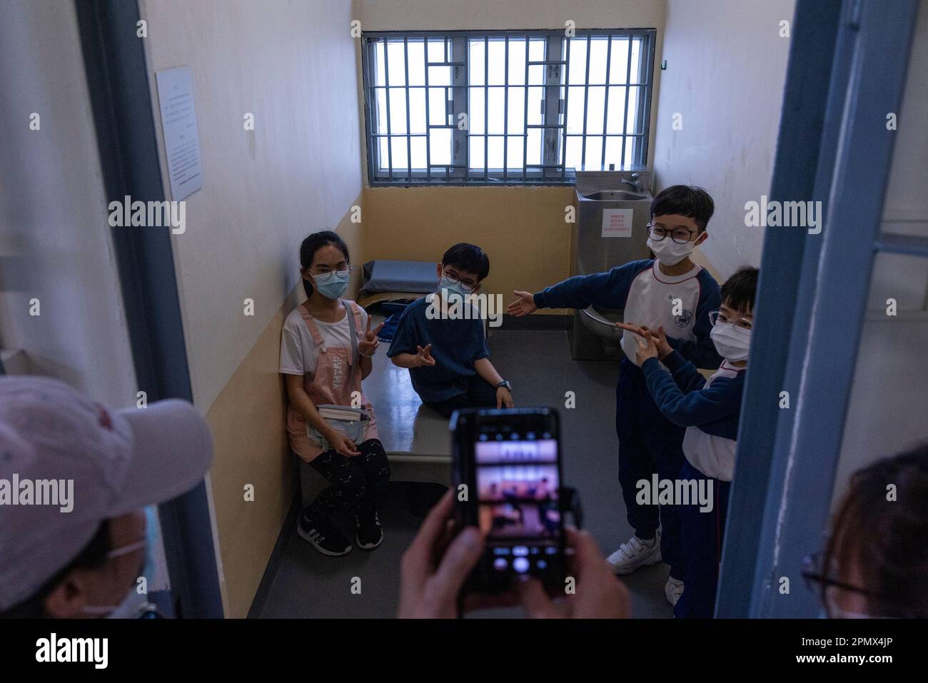 Children visit a mock confinment prison cell at the Hong Kong ...