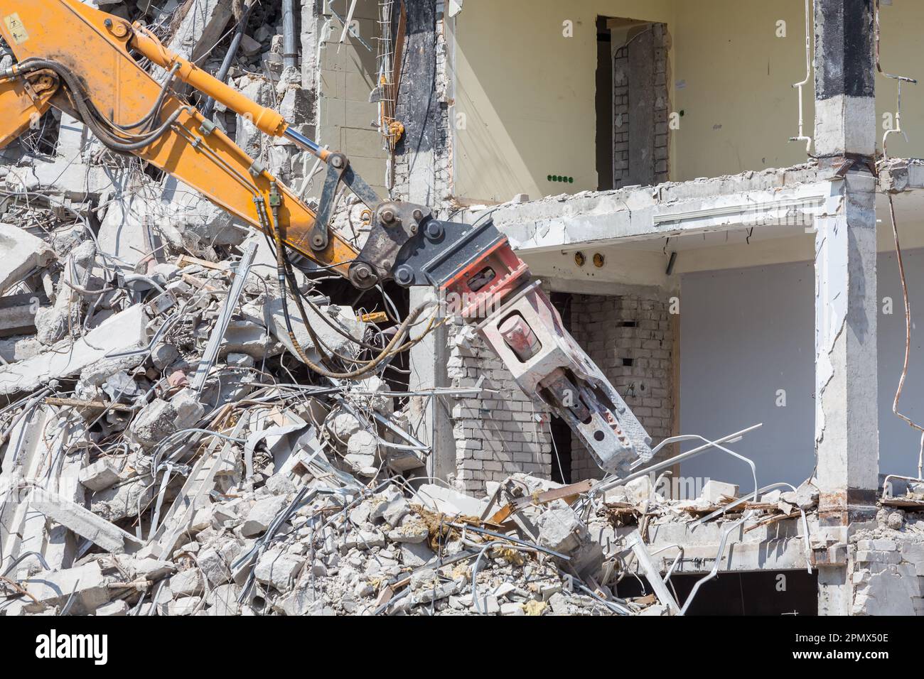Pieces of Metal and Stone are Crumbling from Demolished Stock Photo - Alamy
