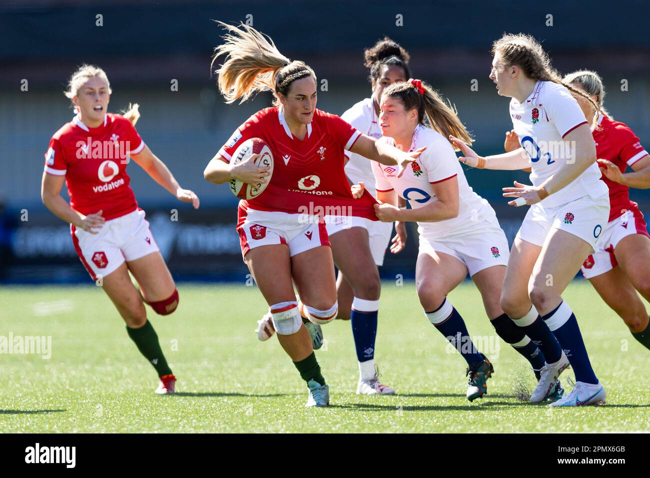 Courtney Keight of Wales Women is tackled by Jess Breach of England ...