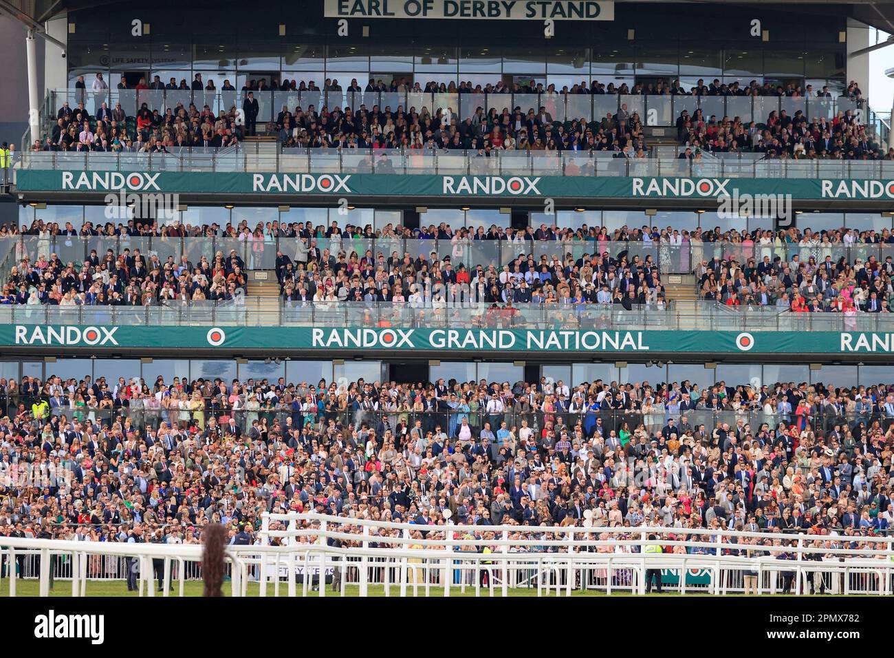 Packed Earl of Derby Grandstand at The Randox Grand National festival 2023 Grand National Day at ...