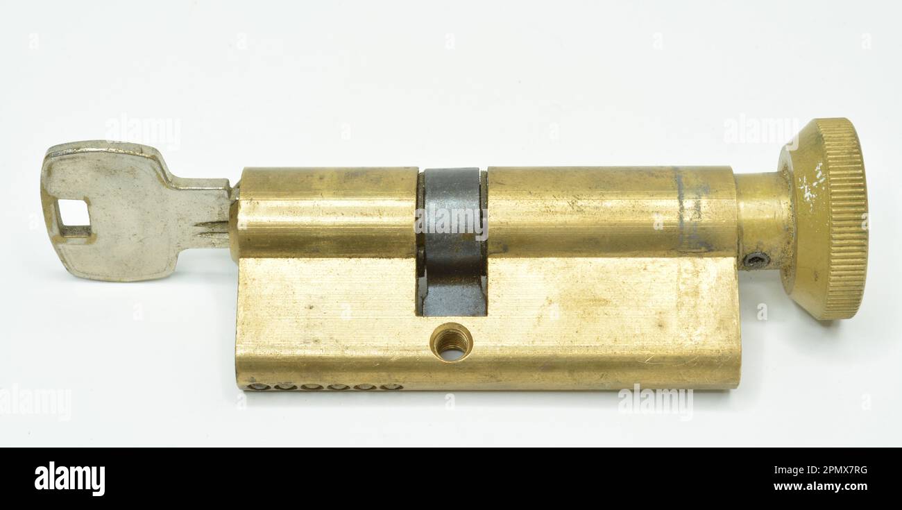 Key and Thumb turn Cylinder on white background Stock Photo - Alamy