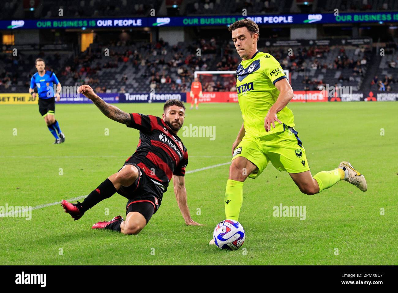 Enrique Lopez of Victory is tackled by Brandon Borello of the Wanderers ...