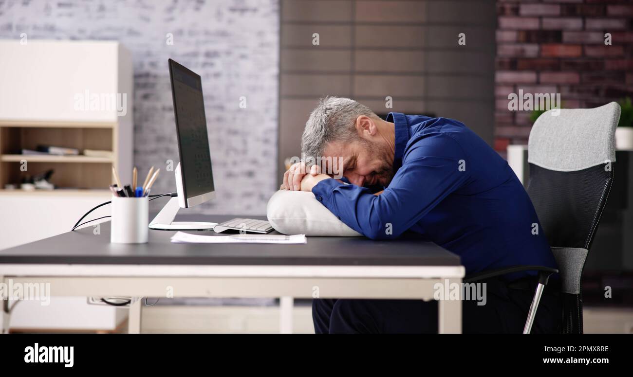 Bored Boss Man Sleeping. Restful Tired Employee Stock Photo - Alamy