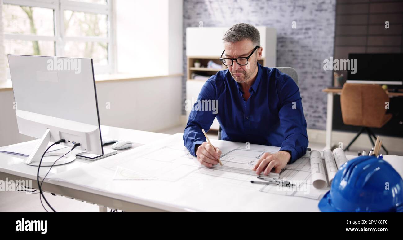 Architect Engineer Drawing Architectural Construction Plan In Office ...