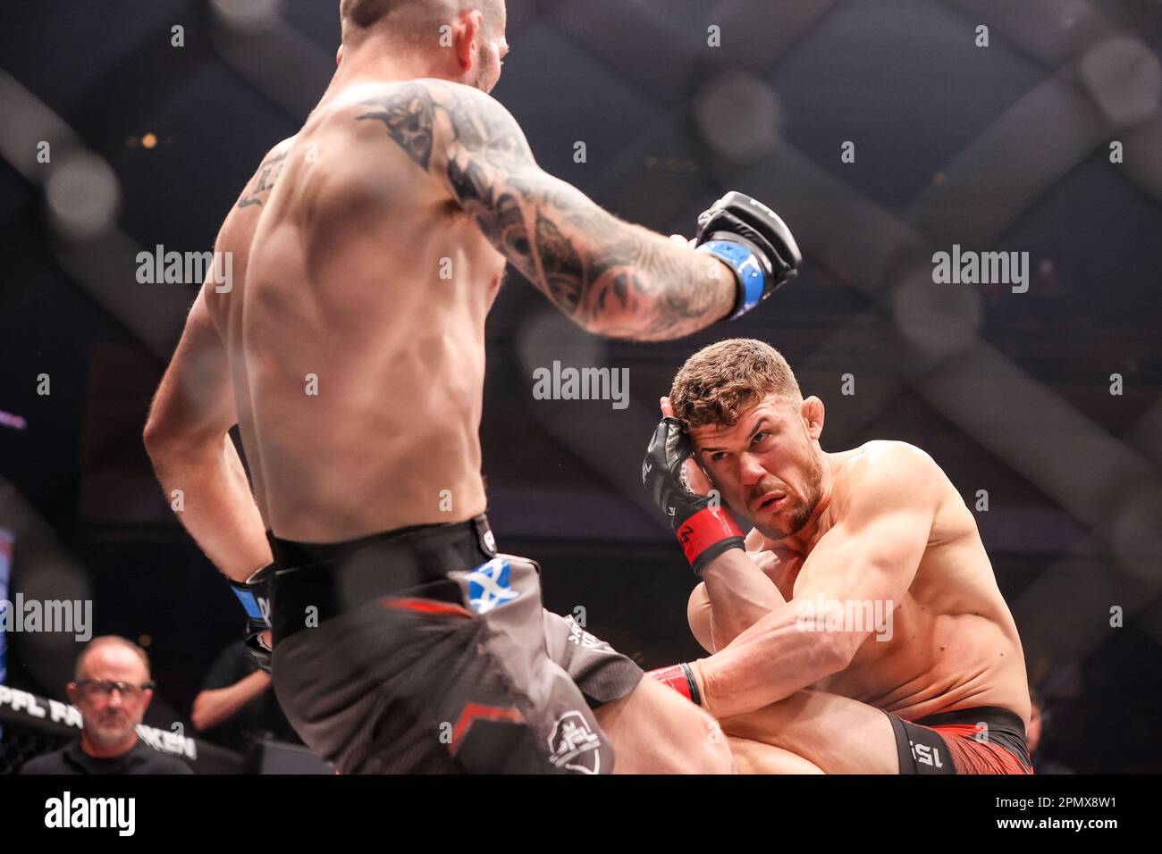 April 14, 2023: (R-L) Lightweight Natan Schulte blocks a kick by Stevie ...