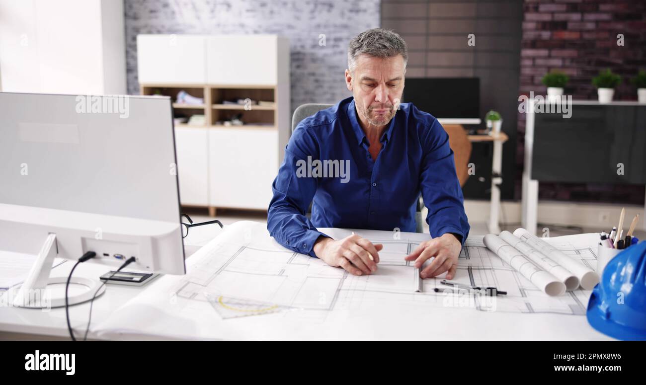 Architect Engineer Drawing Architectural Construction Plan In Office ...