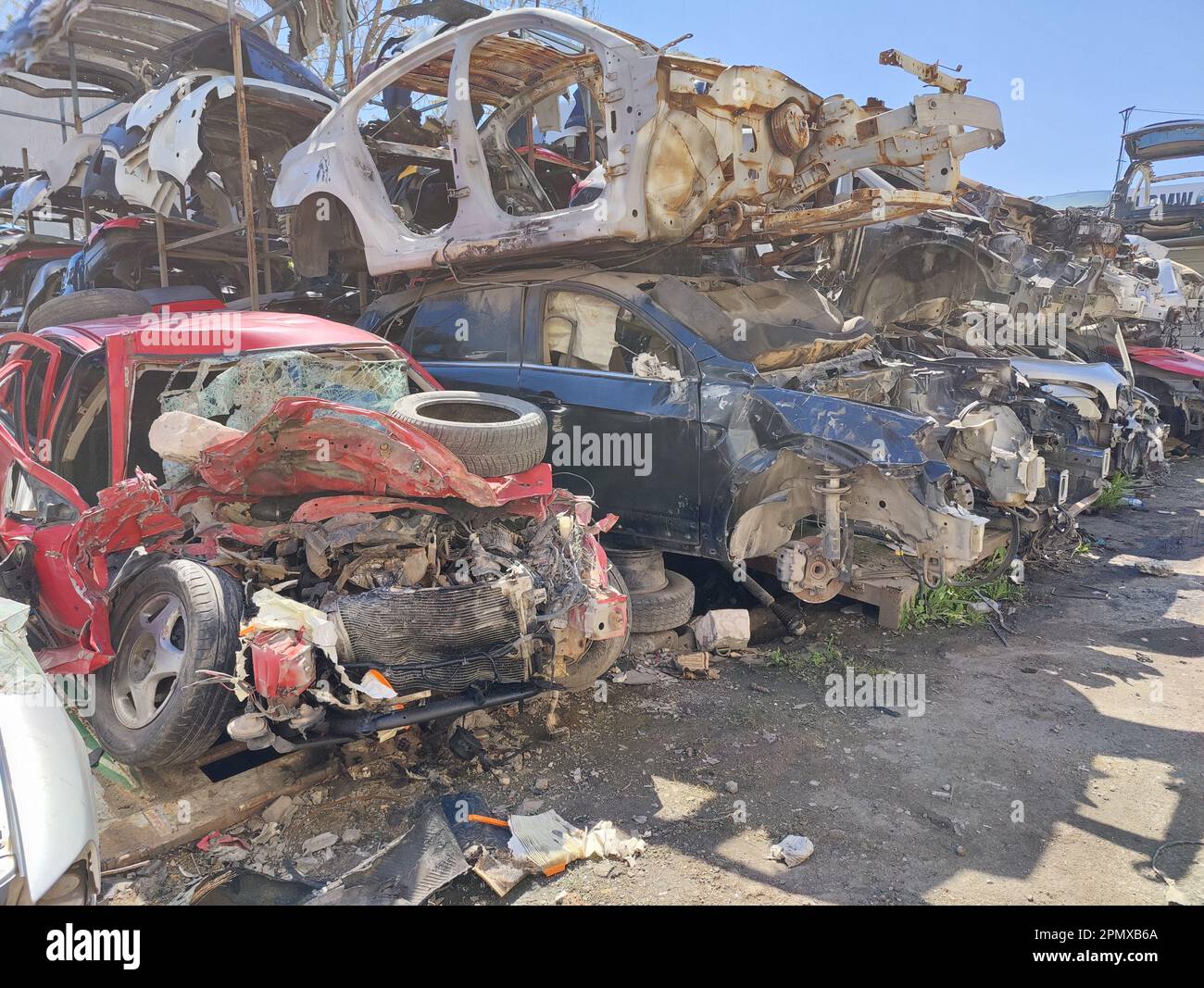 Scrapped cars and vehicles in the ruined city after earthquake, tsunami ...