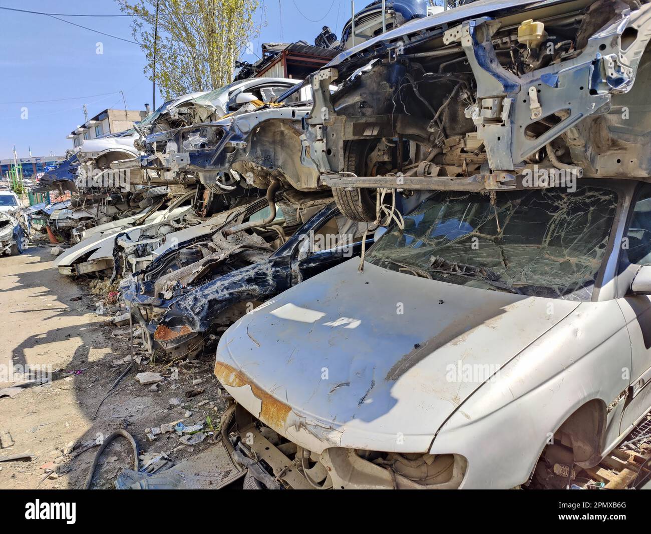 Scrapped cars and vehicles in the ruined city after earthquake, tsunami ...