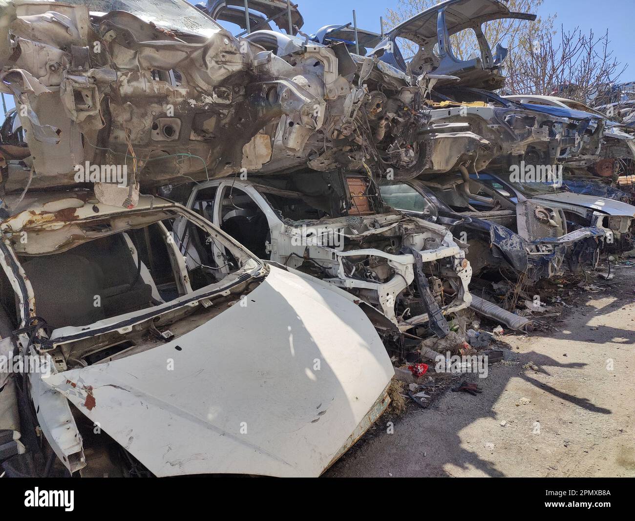 Scrapped cars and vehicles in the ruined city after earthquake, tsunami ...