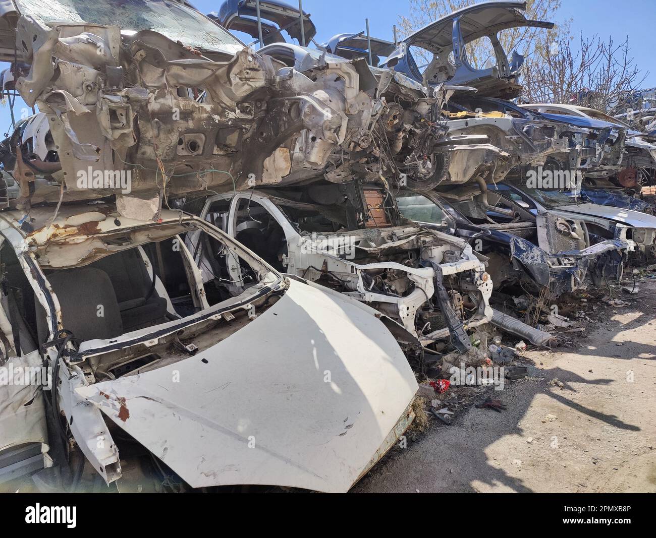 Scrapped cars and vehicles in the ruined city after earthquake, tsunami ...
