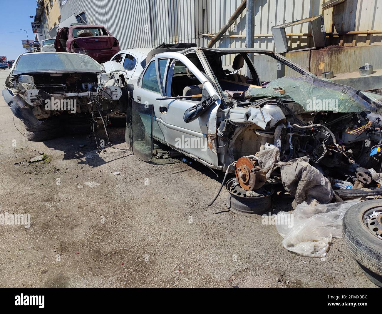 Scrapped cars and vehicles in the ruined city after earthquake, tsunami ...