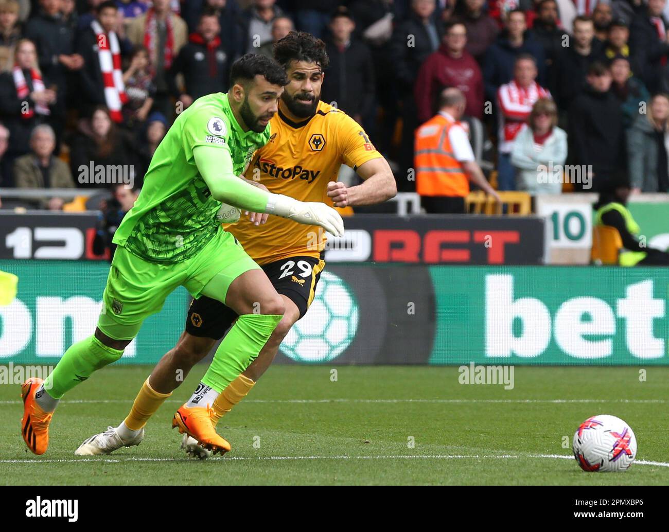 Brentford goalkeeper David Raya collides with Wolverhampton Wanderers' Diego Costa during the ...