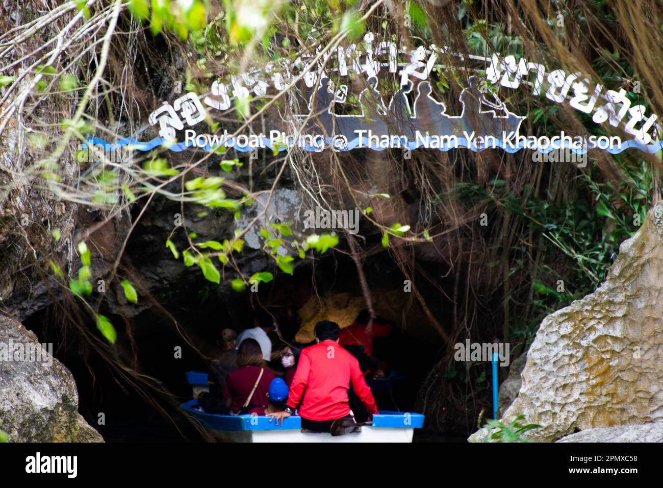 Officer local guide bring thai people travelers sit on boat through the ...