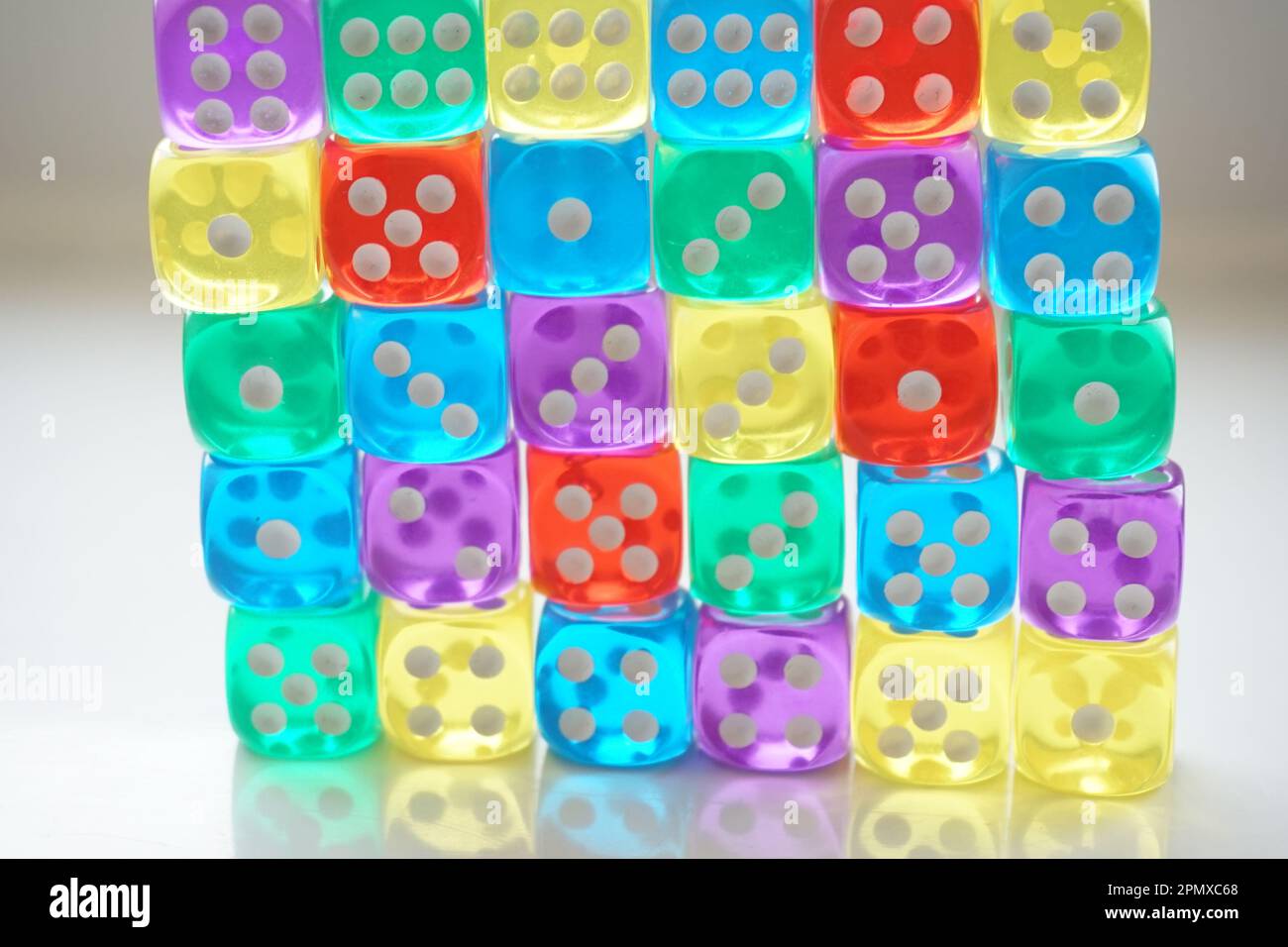 Colourful D6 dice from Sagrada board game Stock Photo - Alamy