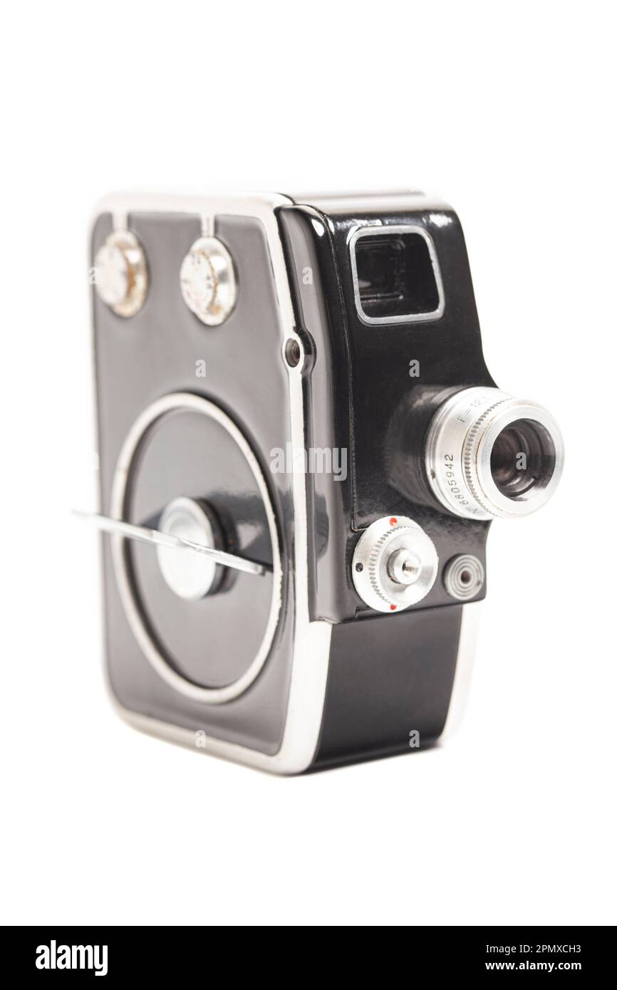 Vintage movie camera isolated on white Stock Photo - Alamy