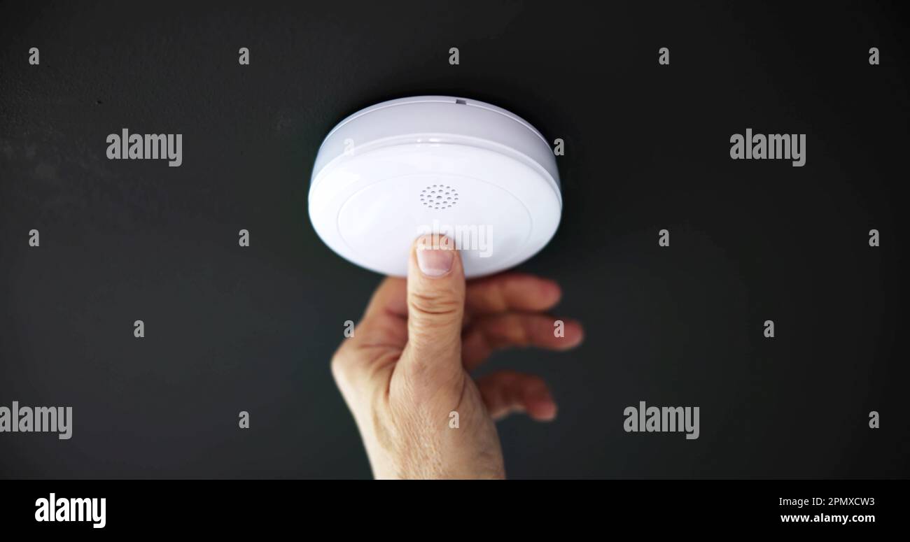 Smoke Fire Alarm Detector Check. Carbon Monoxide Safety Stock Photo - Alamy