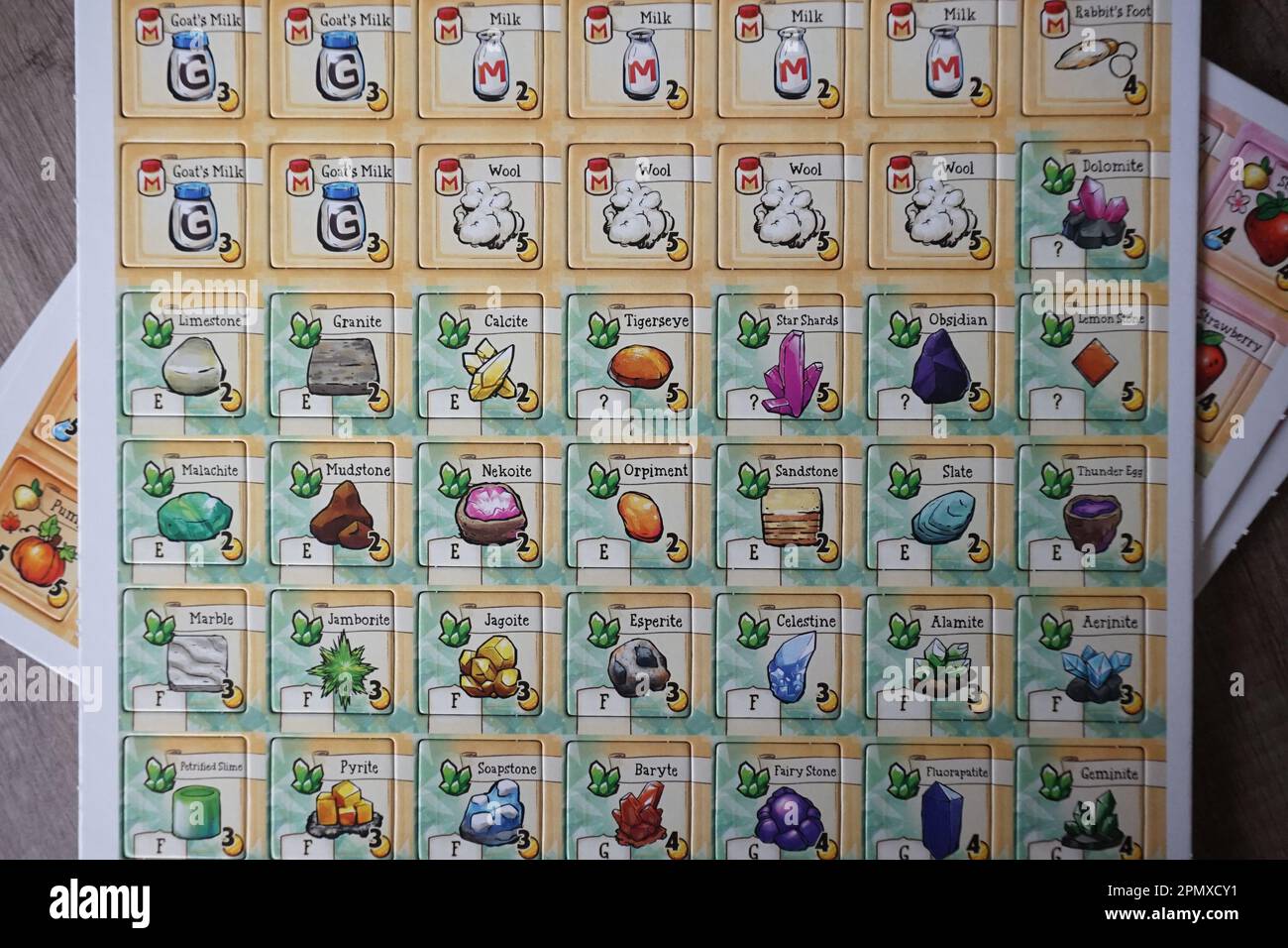 Pieces and cardboard tokens from Stardew Valley the board game Stock ...