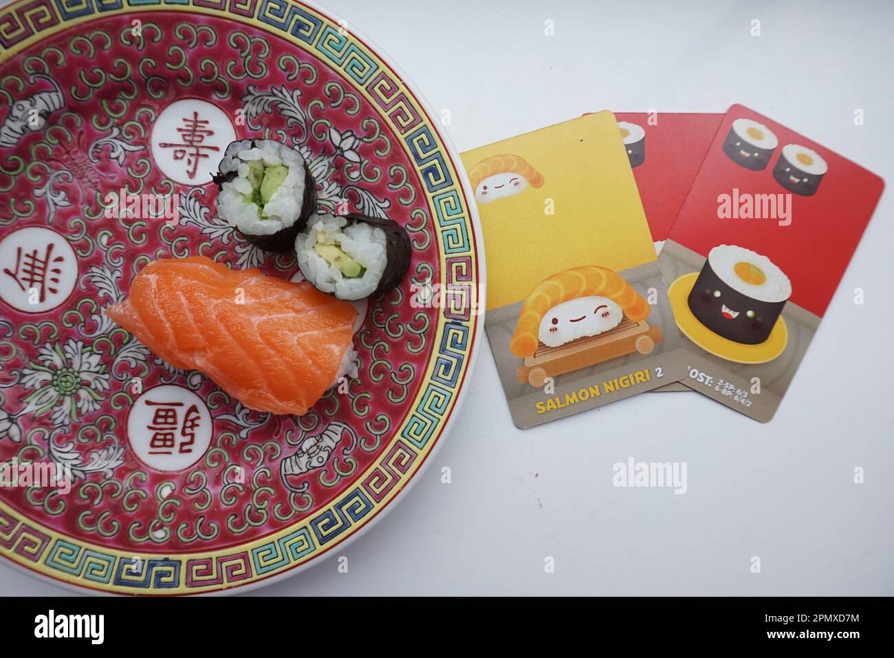 Sushi alongside the matching sushi cards from Sushi Go card game Stock ...