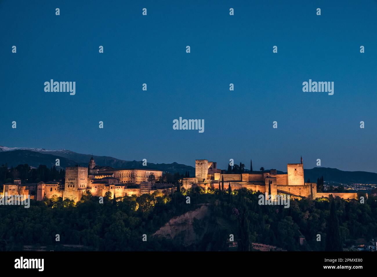 Photography of the Alhambra at night illuminated Stock Photo - Alamy