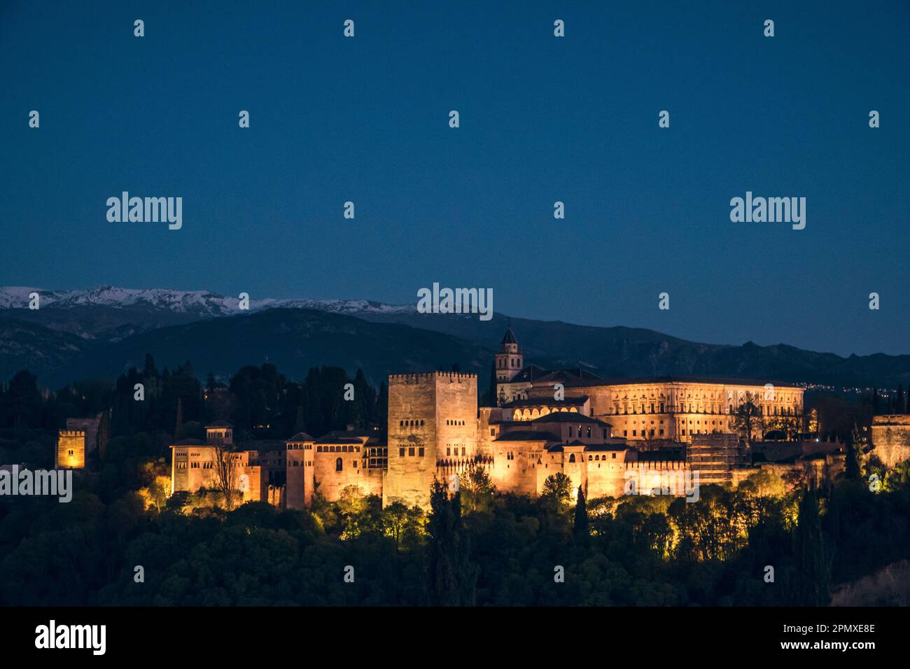 Photography of the Alhambra at night illuminated Stock Photo - Alamy