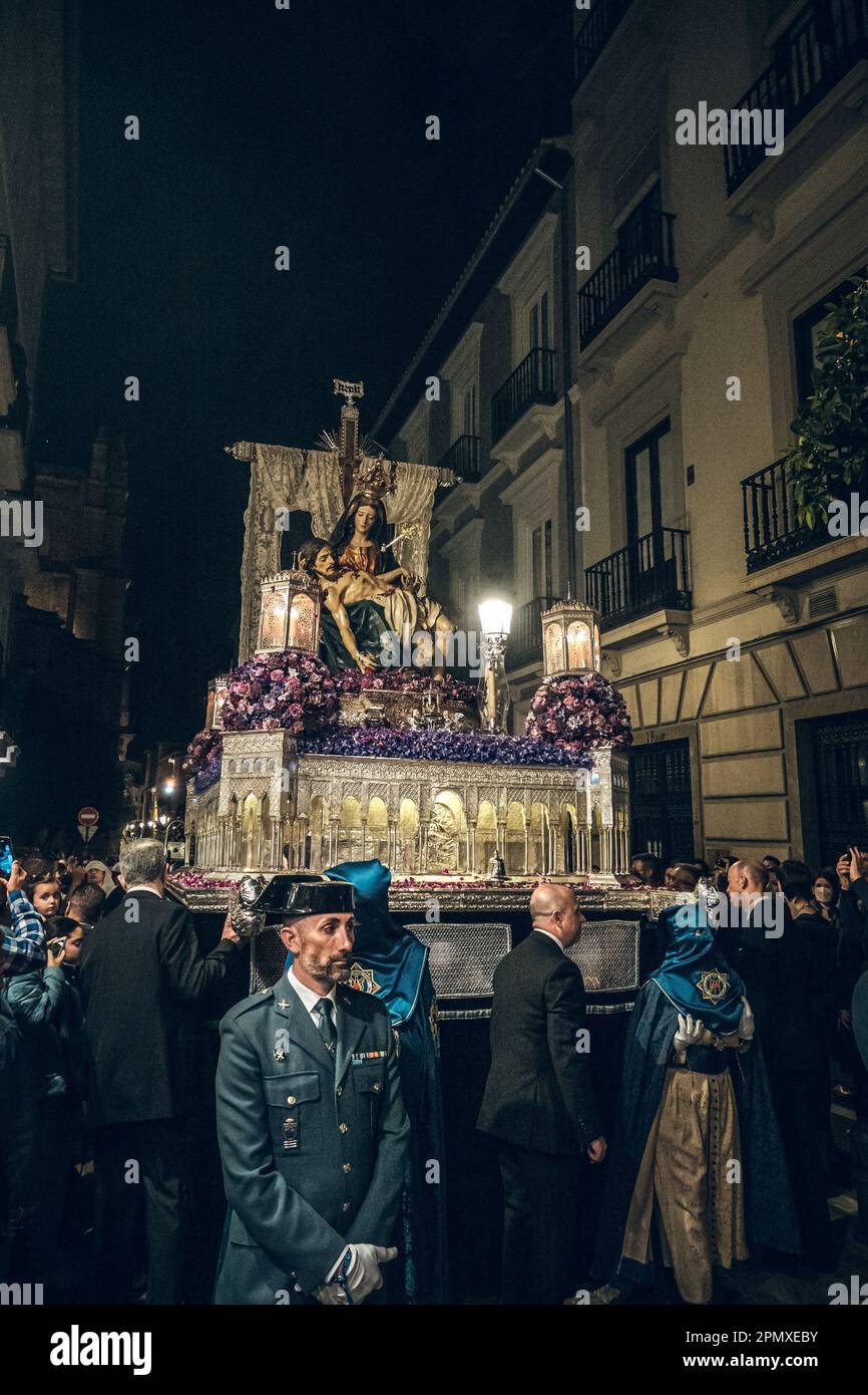 Holy Week procession through the streets of Seville Stock Photo - Alamy