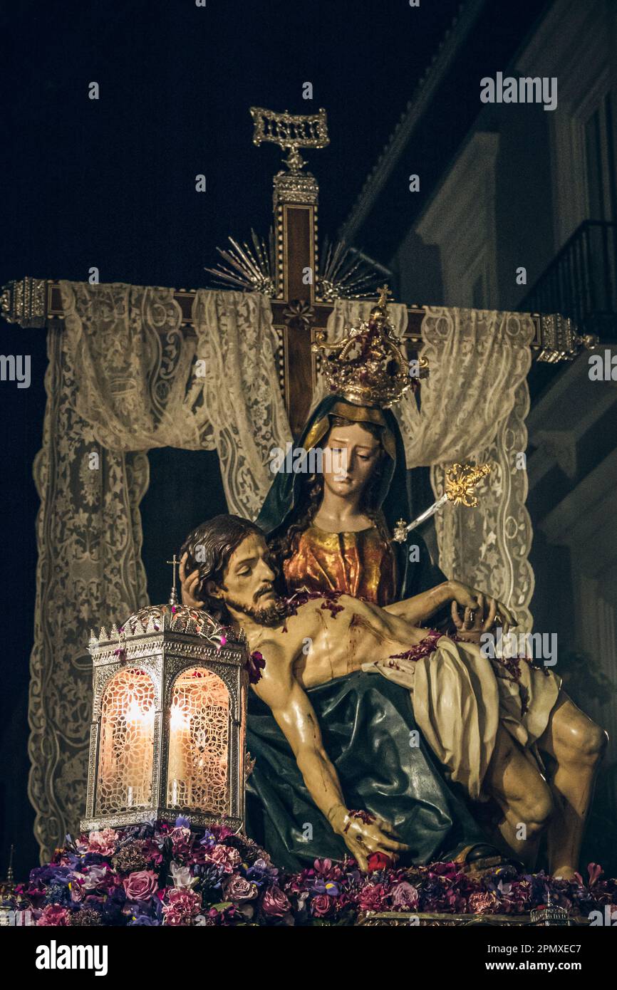 Holy Week procession through the streets of Seville Stock Photo - Alamy