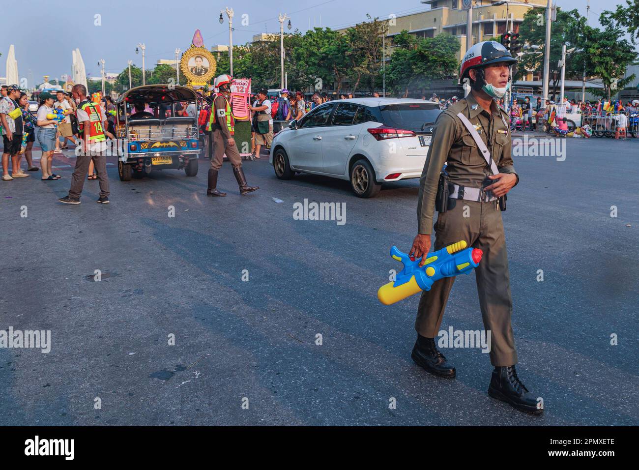 Bangkok, Thailand. 15th Apr, 2023. Police officer holds a water gun ...