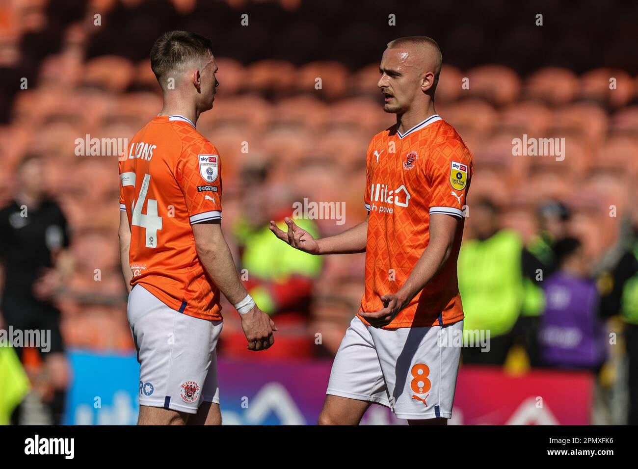 Blackpool, UK. 15th Apr, 2023. Andy Lyons #24 of Blackpool and Lewis ...