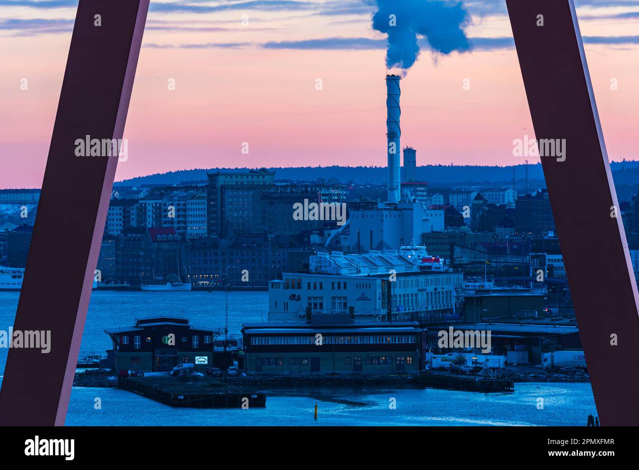 A stunning Gothenburg skyline reflects off the calm sea at dawn, with ...