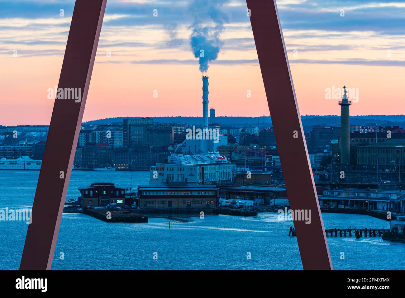 A stunning Gothenburg skyline reflects off the calm sea at dawn, with ...