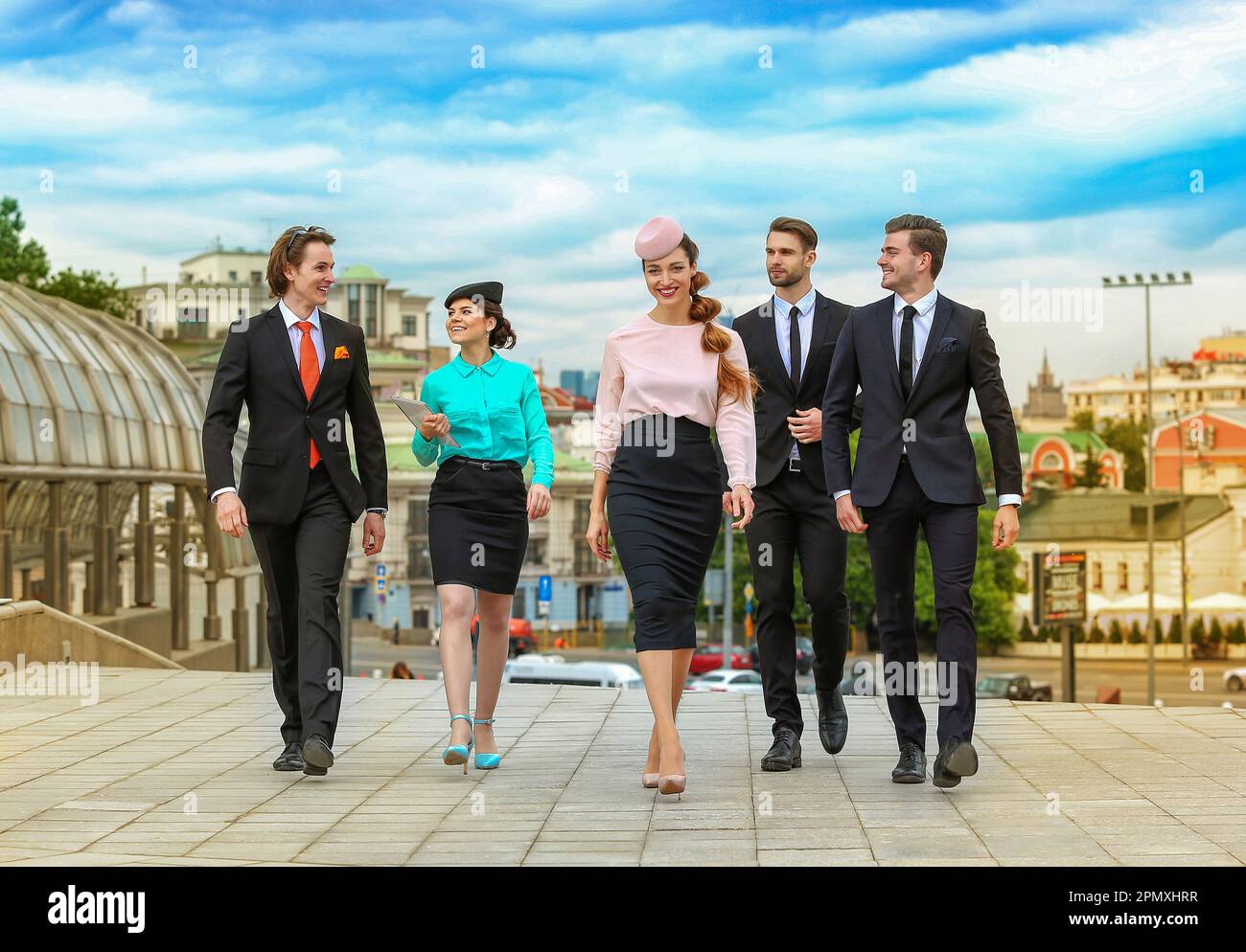 A group of office employees spend time outside at lunchtime Stock Photo ...