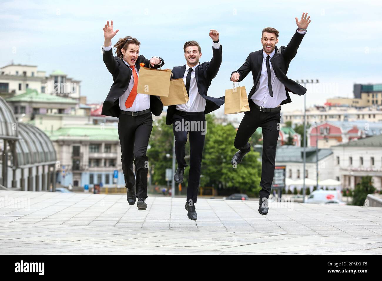 A group of office employees spend time outside at lunchtime Stock Photo ...
